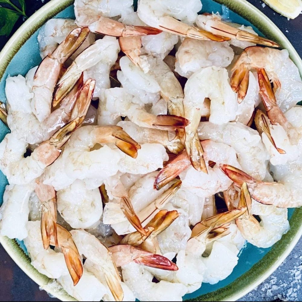 Grilled wild caught prawns with Asian herb salad, roast peanuts